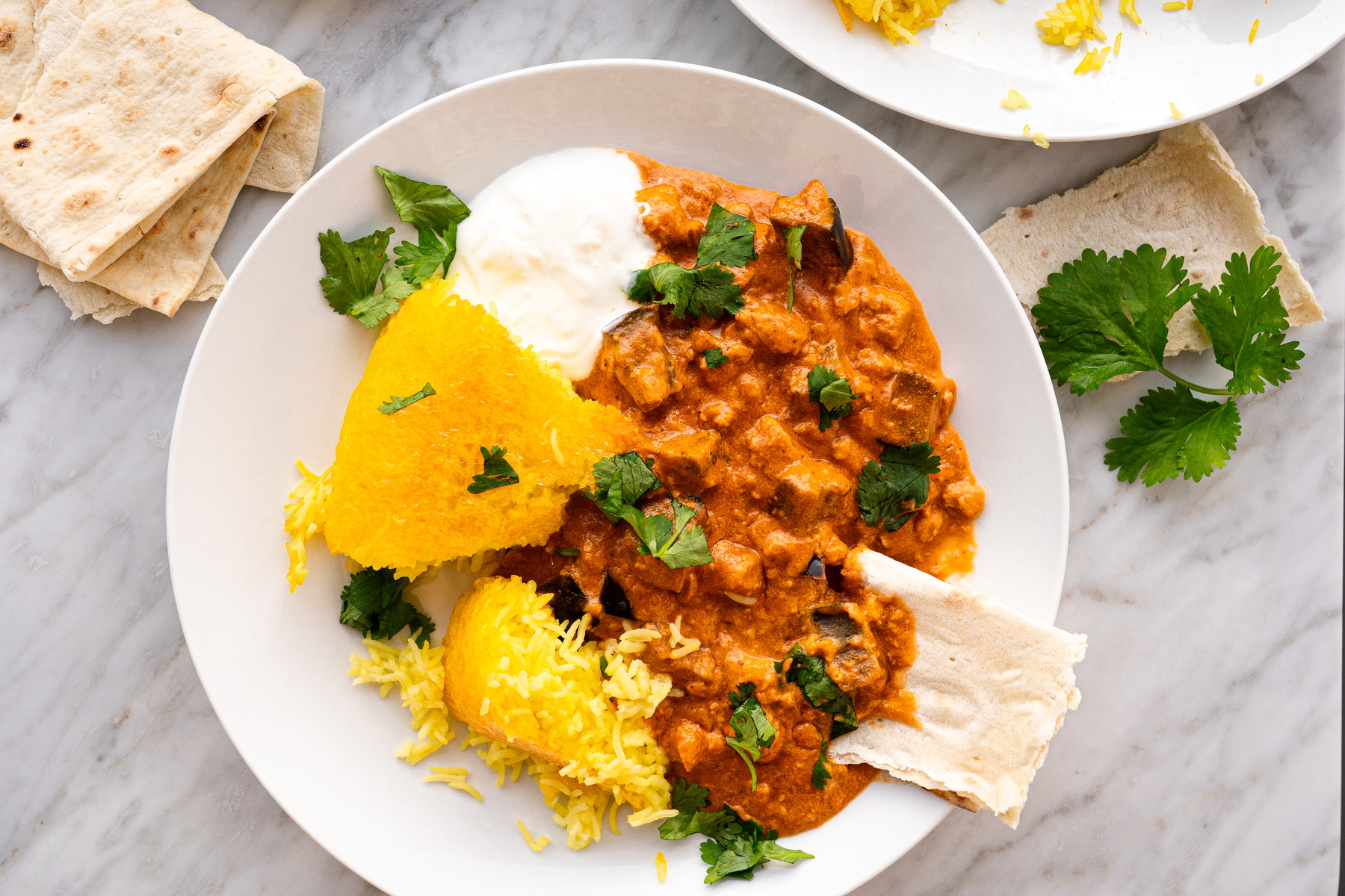 Rezept für Butter Chicken mit Tahdig | REISHUNGER